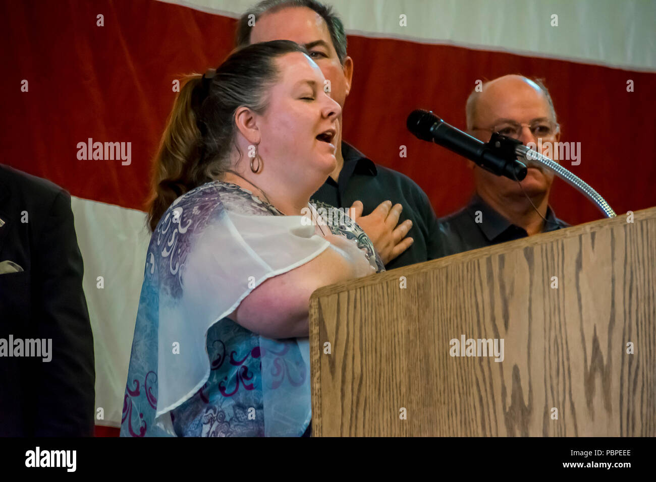 Michelle Long sings the National Anthem during the groundbreaking ...