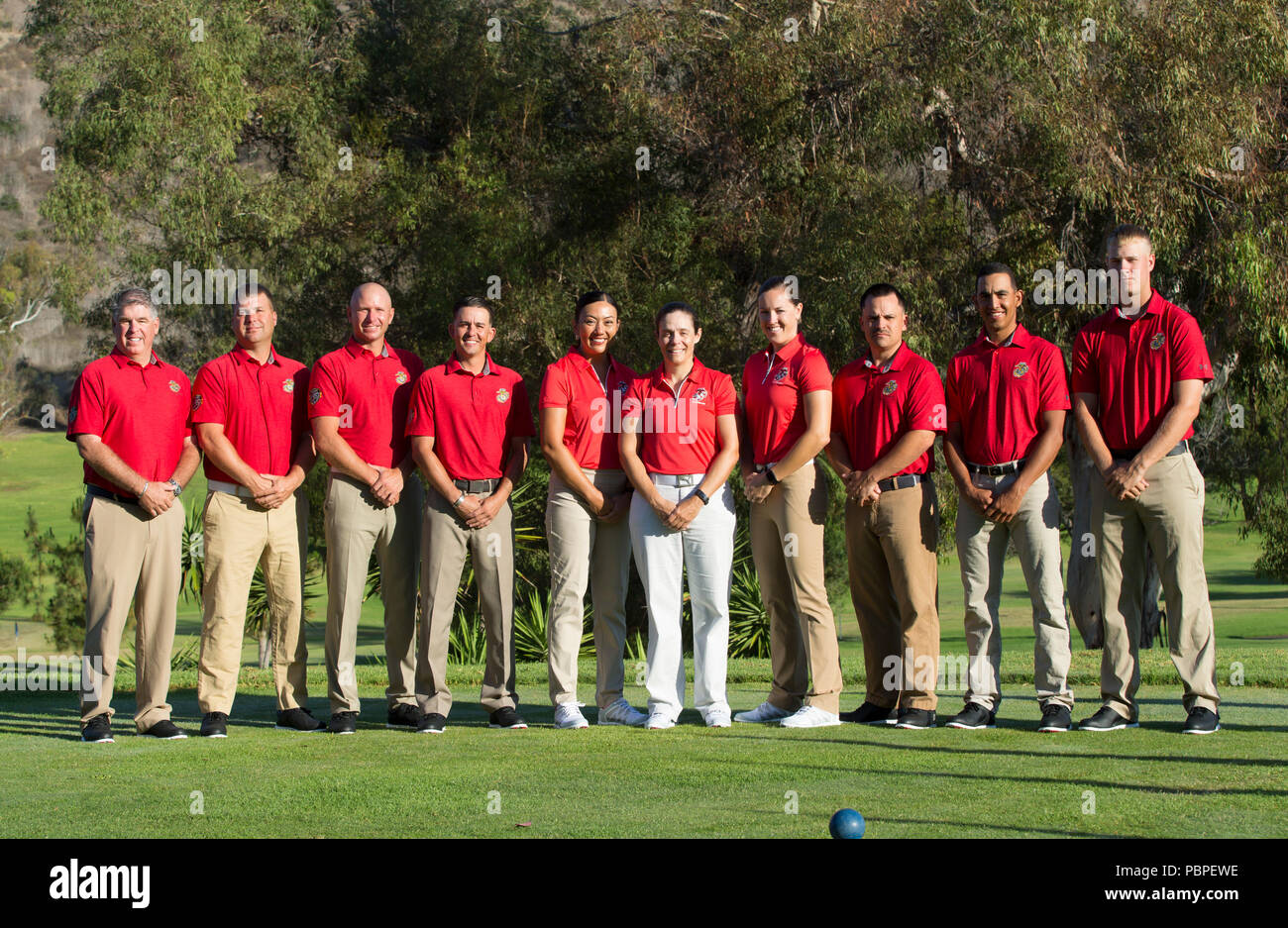 Members of the U.S. Marine Corps’ golf team pose for a group photo ...