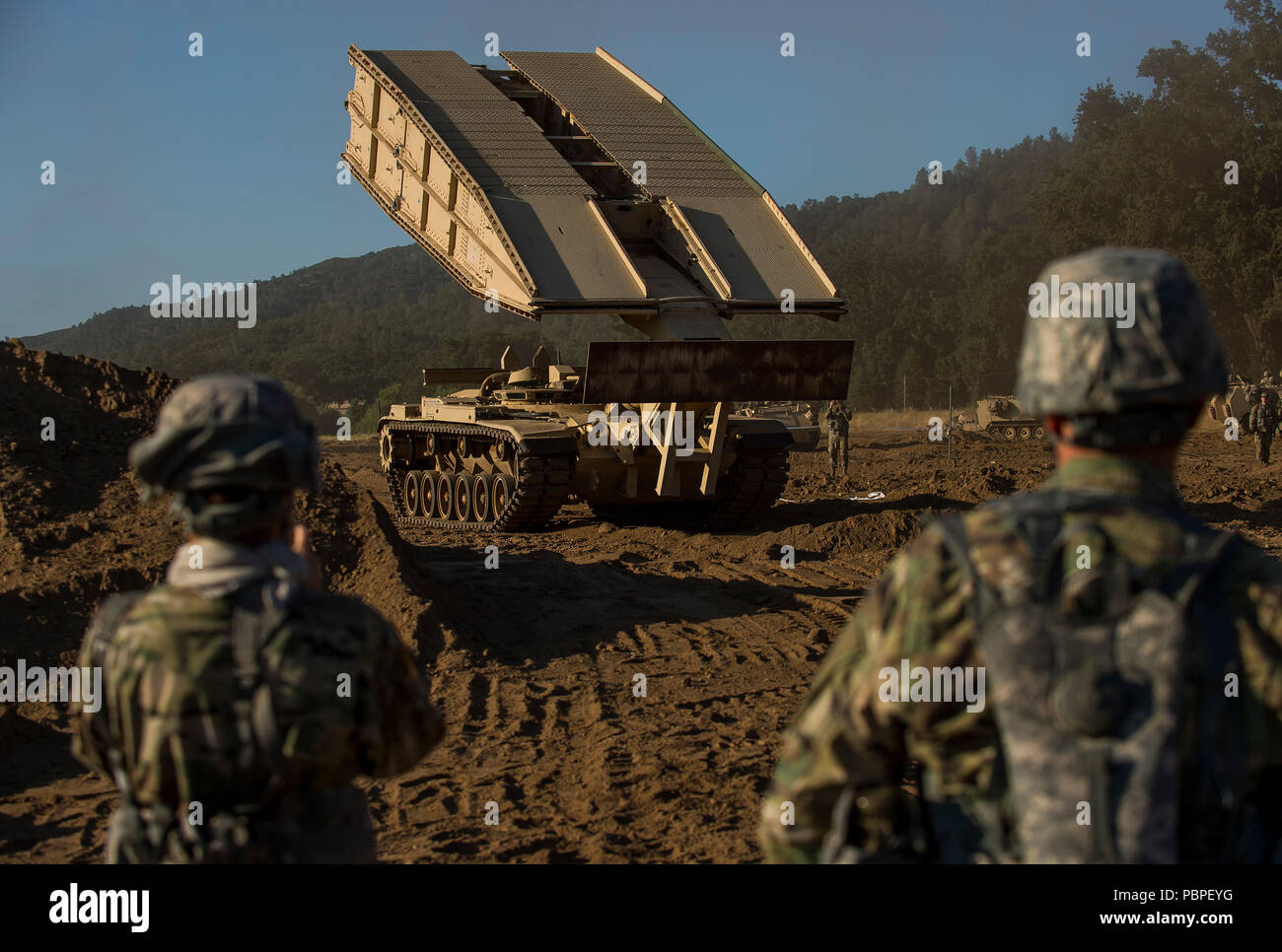 U.S. Army Reserve combat engineer Soldiers use an M60 Armored Vehicle ...