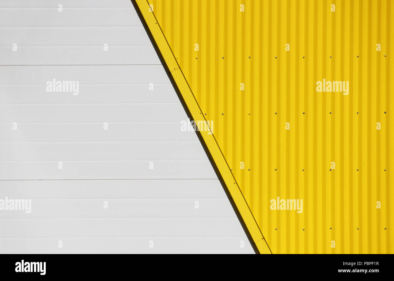 Wall of large shopping center with a beige and yellow background Stock ...