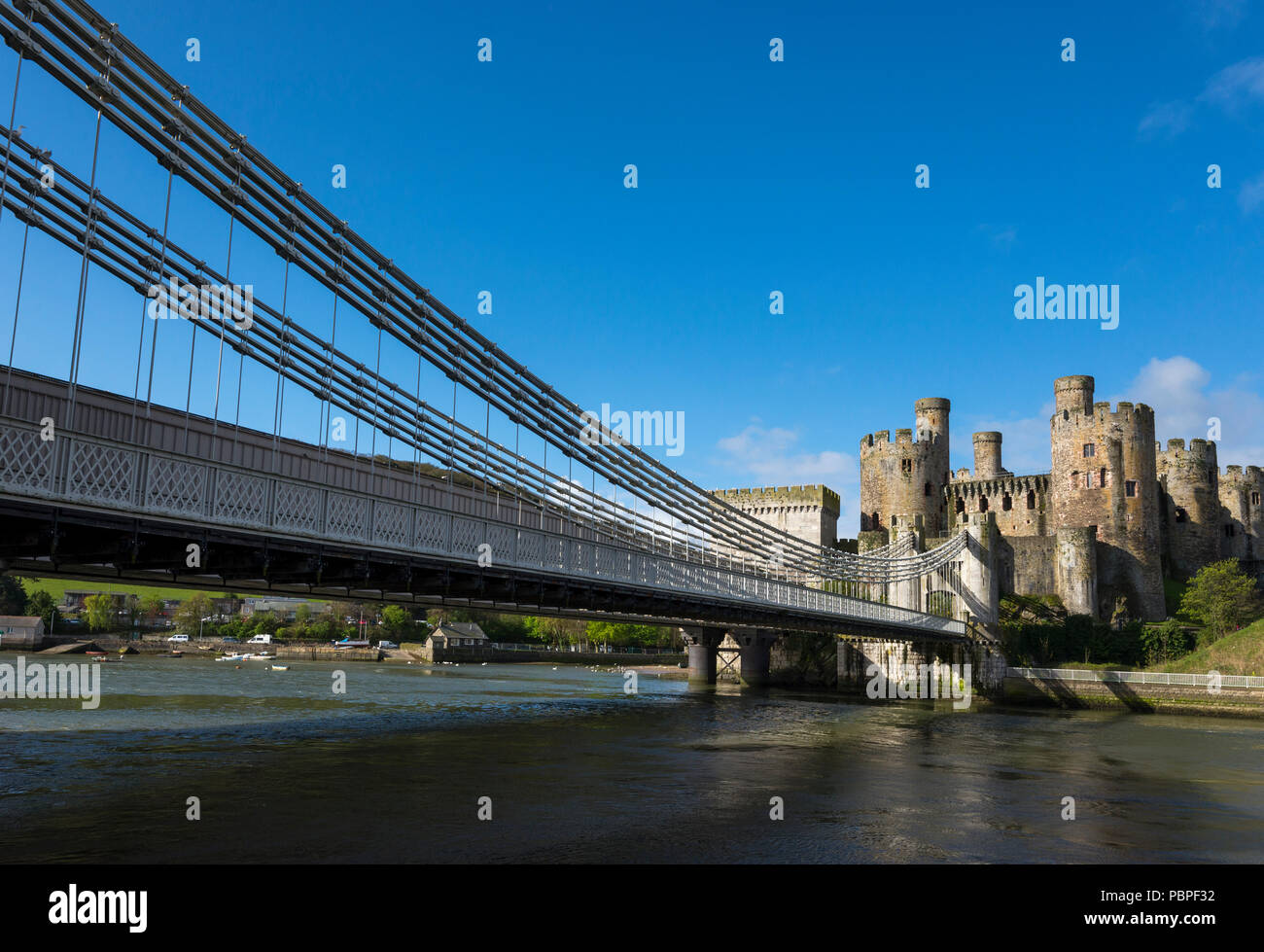 Conwy Castle and the famous suspension bridge over the river Conwy ...