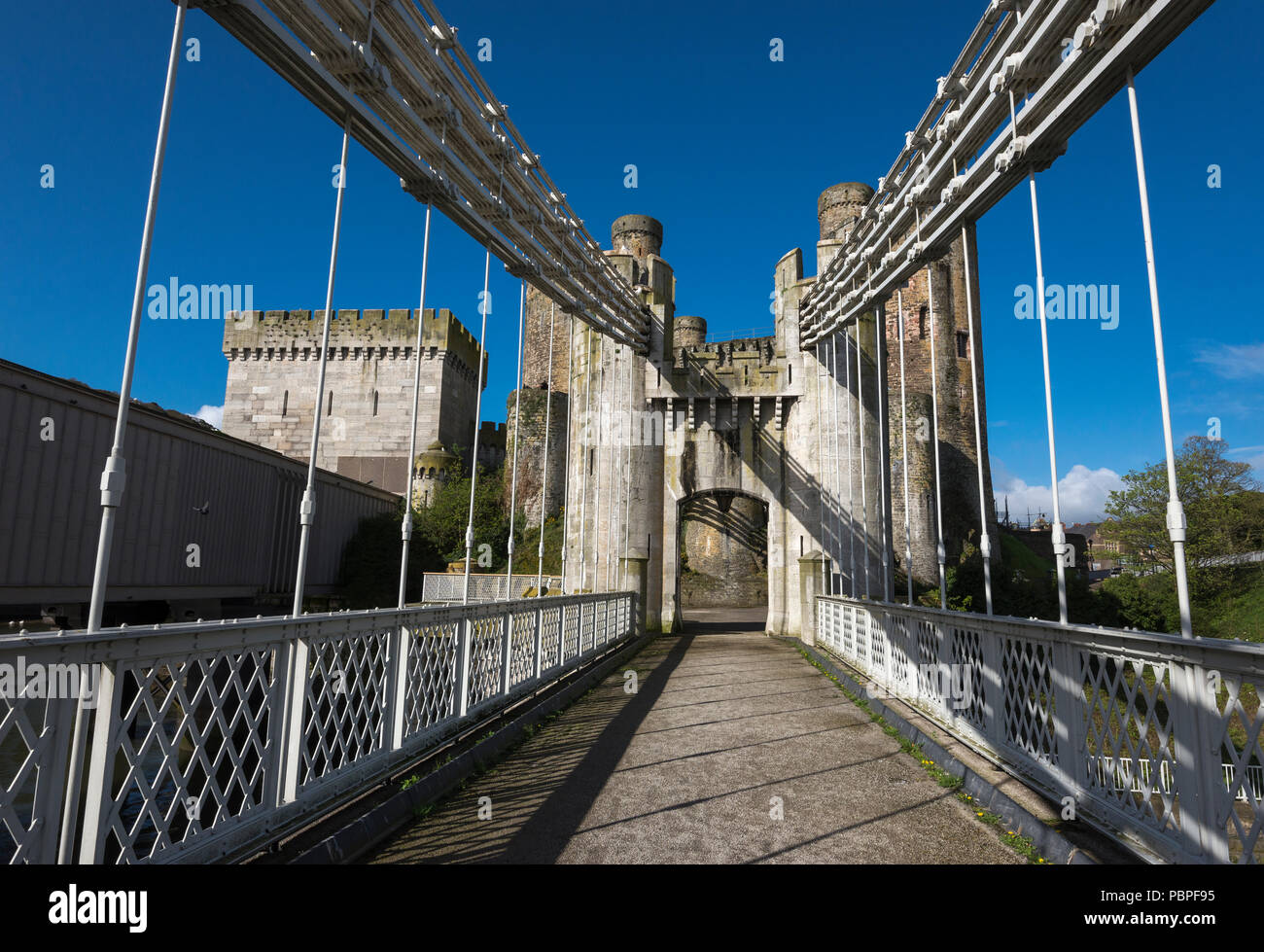 View of Conwy castle from the end of the famous suspension bridge ...