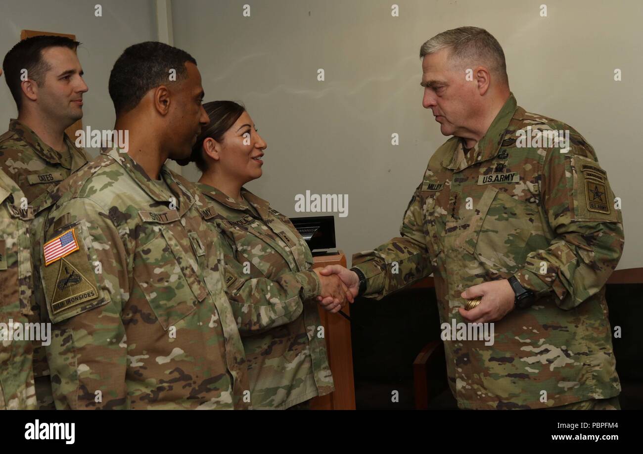 Chief of Staff of the Army Gen. Mark A. Milley presents Chief Warrant 3 ...