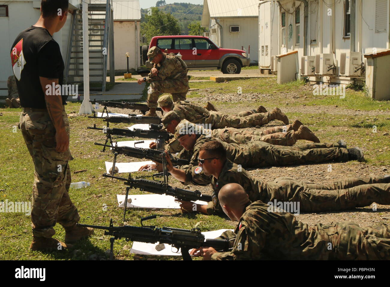 Sgt. 1st Class David V. Martinez, far left, a Ranger-qualified platoon ...