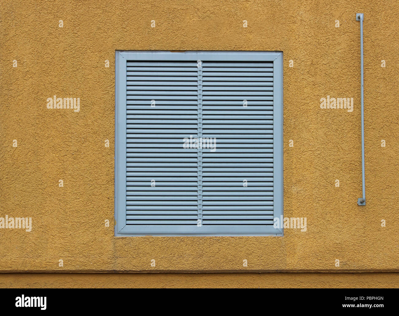 A window in a large industrial shopping center closed with external ...