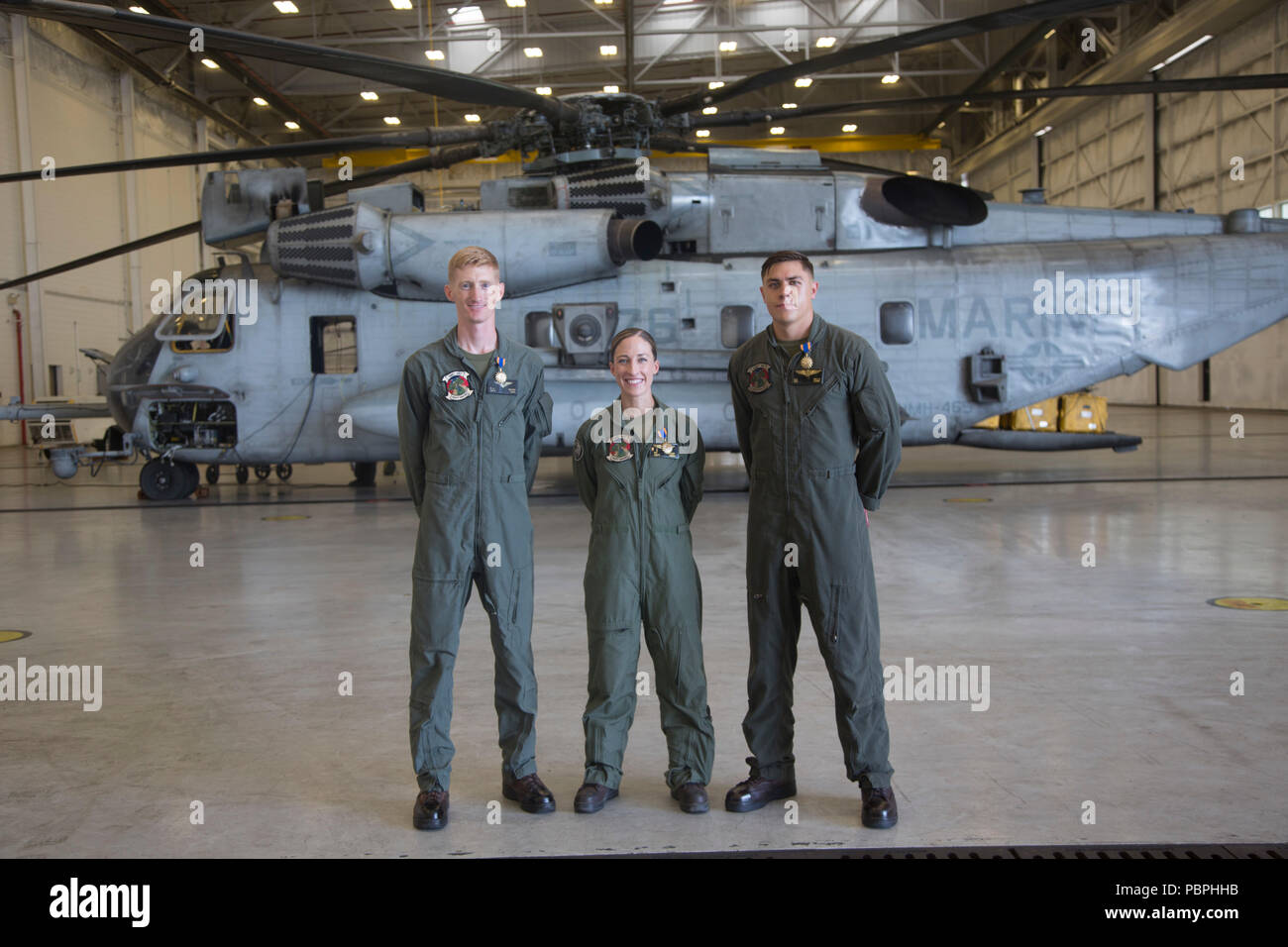 Capt. Ryan J. Boyer (left), Capt. Molly A. O’Malley (center), and Sgt ...