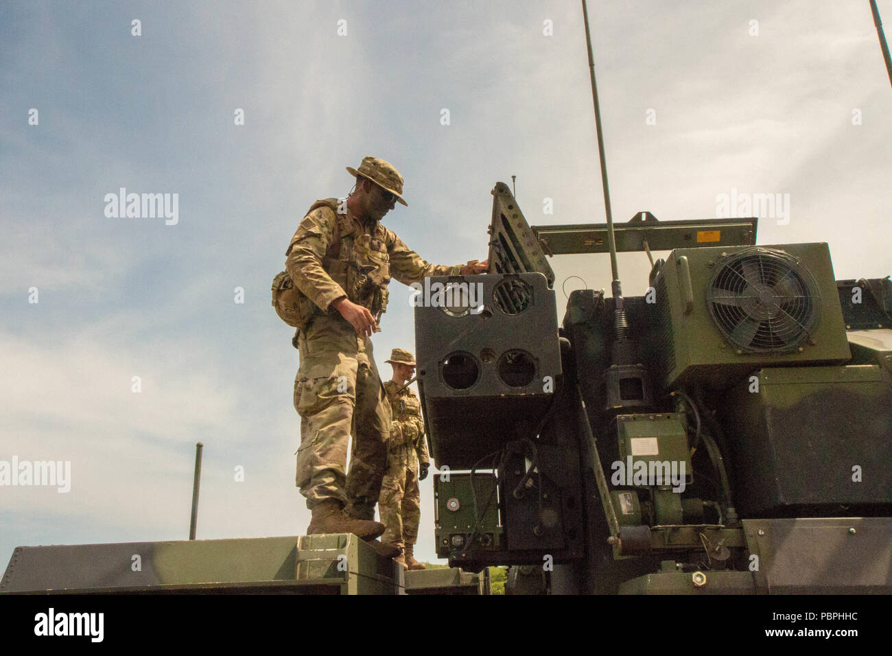 A Soldier with the 35th Air Defense Artillery Brigade, prepares to load ...