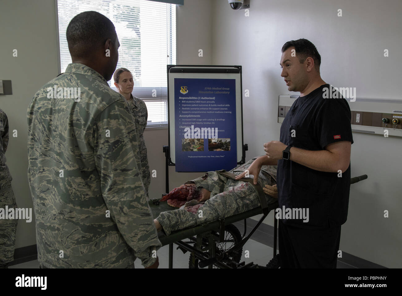 Dominic Trujillo-Hobbs, 374th Medical Group simulation operator, briefs ...