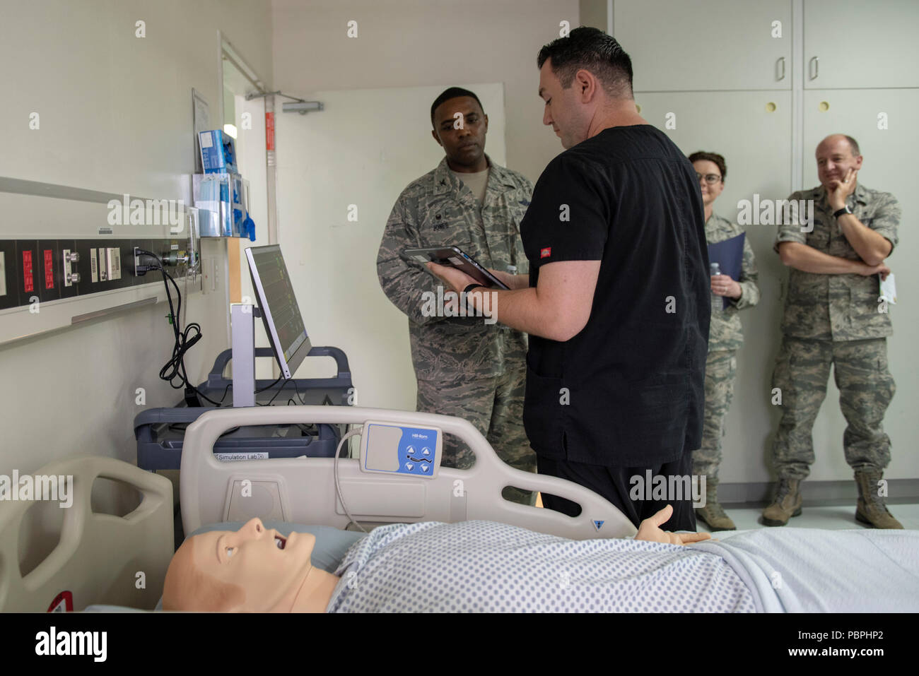 Dominic Trujillo-Hobbs, 374th Medical Group simulation operator, briefs ...