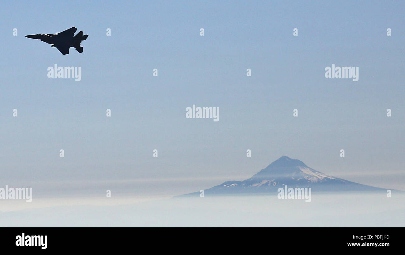A F-15D Eagle intercepts a Civil Air Patrol Cessna 182 Skylane during a ...