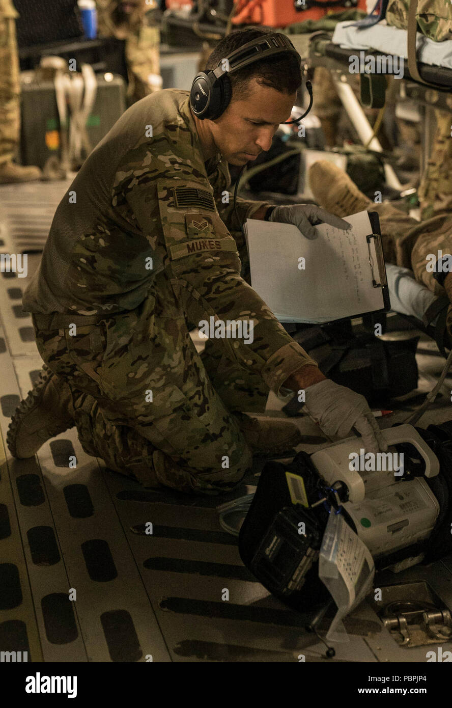 Senior Airman Eric Mukes, flight medic, 455th Expeditionary Aeromedical ...