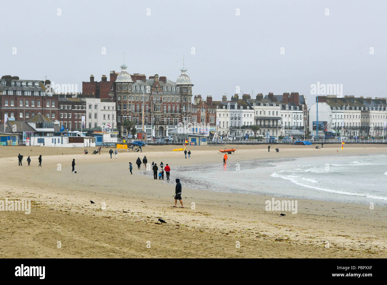 Weymouth, Dorset, UK. 29th July 2018. UK Weather. Holidaymakers brave ...