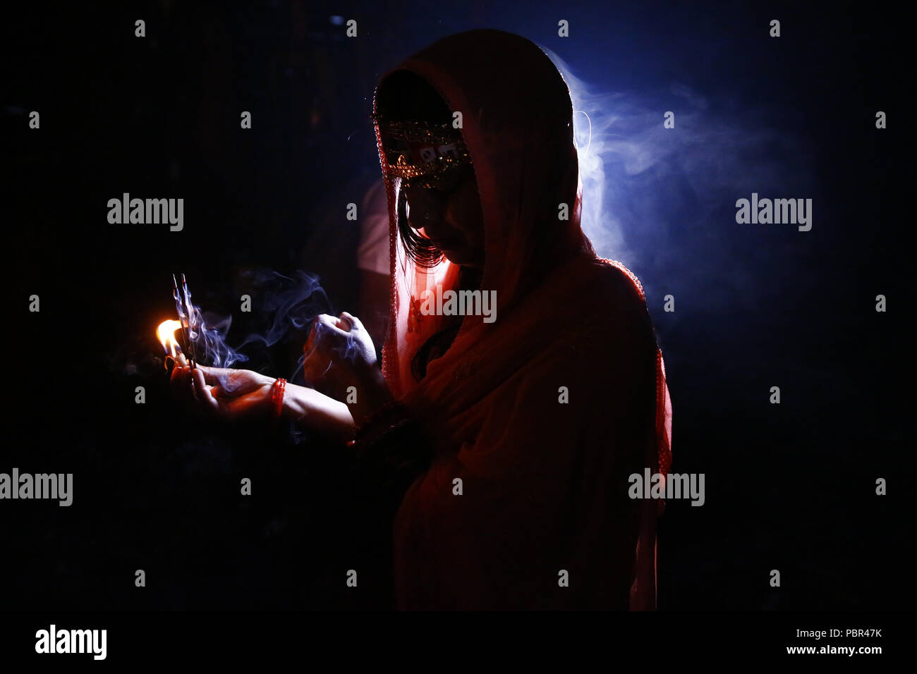 Kathmandu, Nepal. 30th July 2018. A Hindu worshipper or pilgrim also ...
