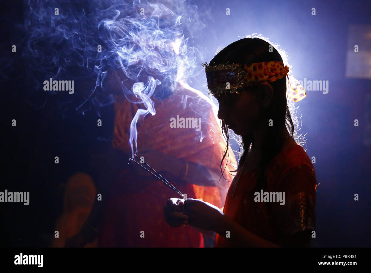 Kathmandu, Nepal. 30th July 2018. A Hindu worshipper or pilgrim also ...