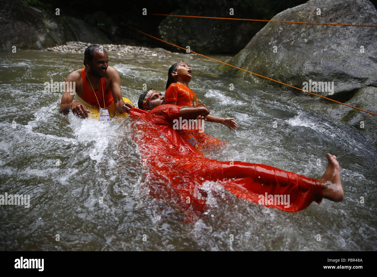 Kathmandu, Nepal. 30th July 2018. Hindu worshippers or pilgrims also ...