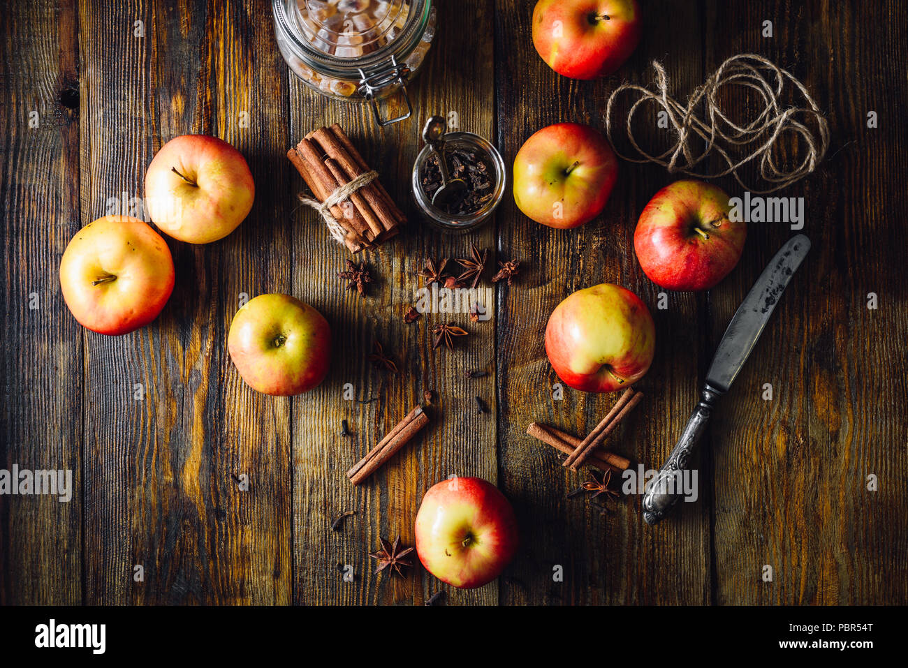 Red Apples with Scattered Clove, Cinnamon and Anise Star. Candy Sugar ...