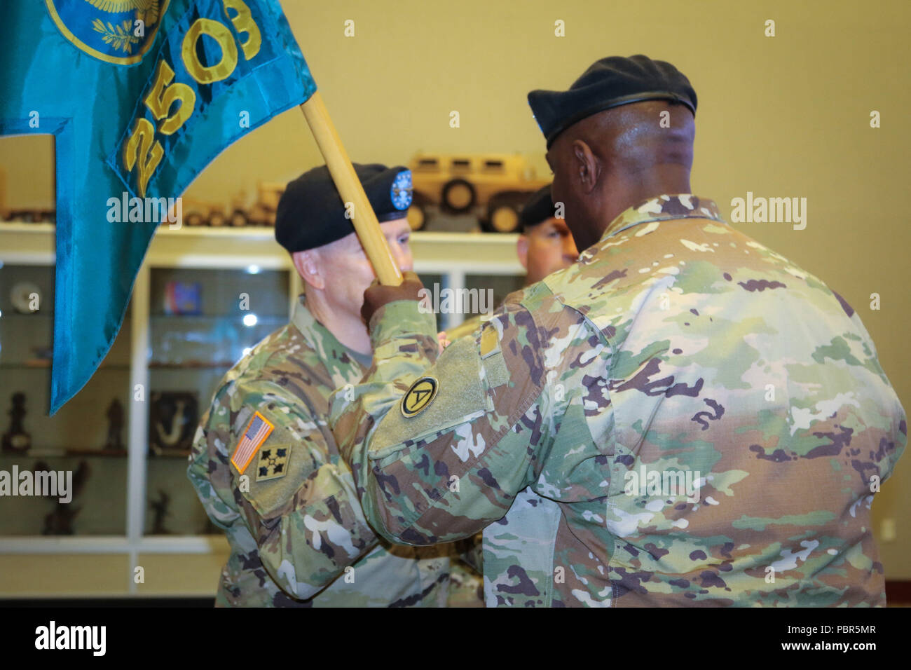 (From right to left) Col. Oscar W. Doward Jr., outgoing commander of ...