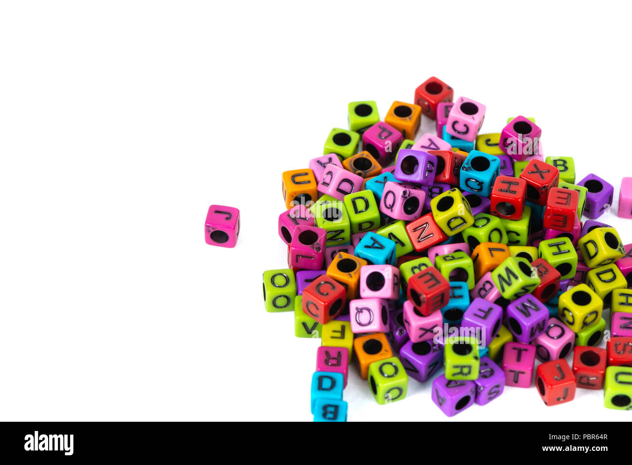 Pile of beads or letter bead with alphabet on white background Stock ...