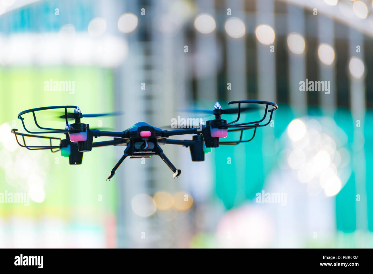Flying drone or quad copter in the air. spy concept Stock Photo - Alamy