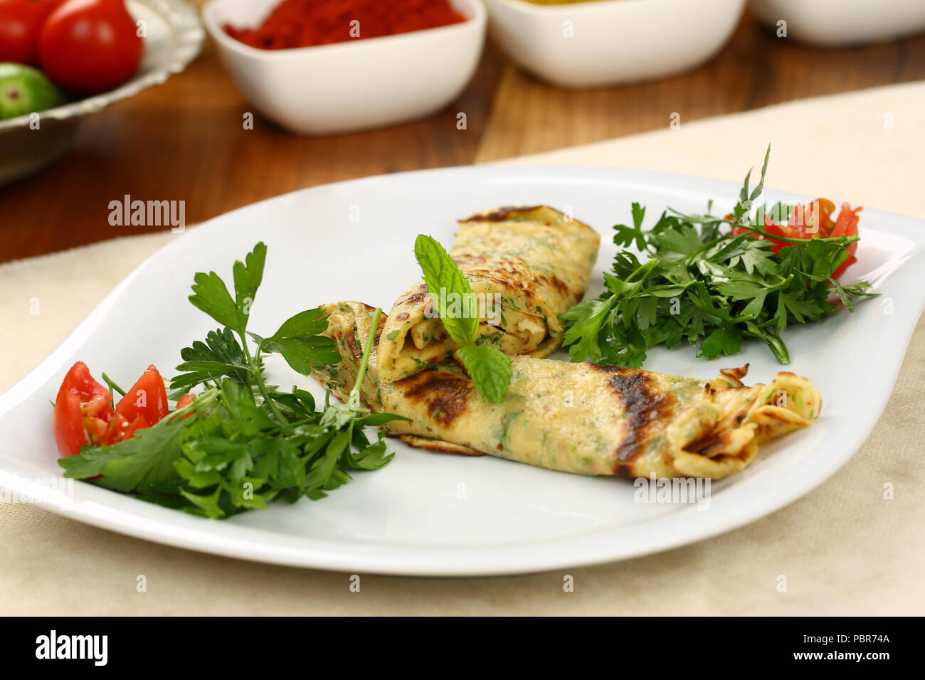 Crepe rolls filled with jam Stock Photo - Alamy