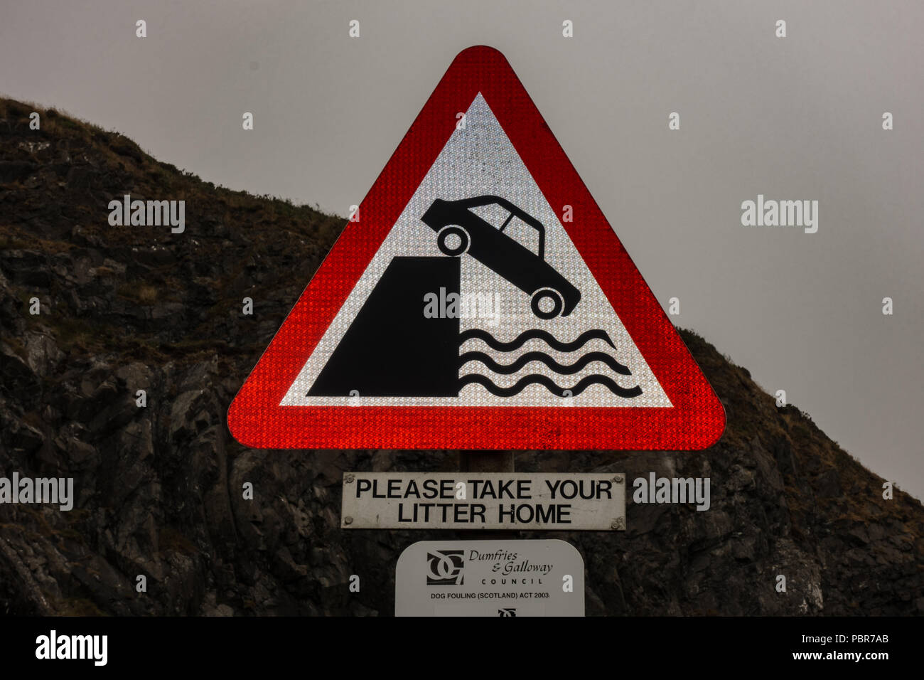 Danger cliff sign Portpatrick, Scotland Stock Photo - Alamy