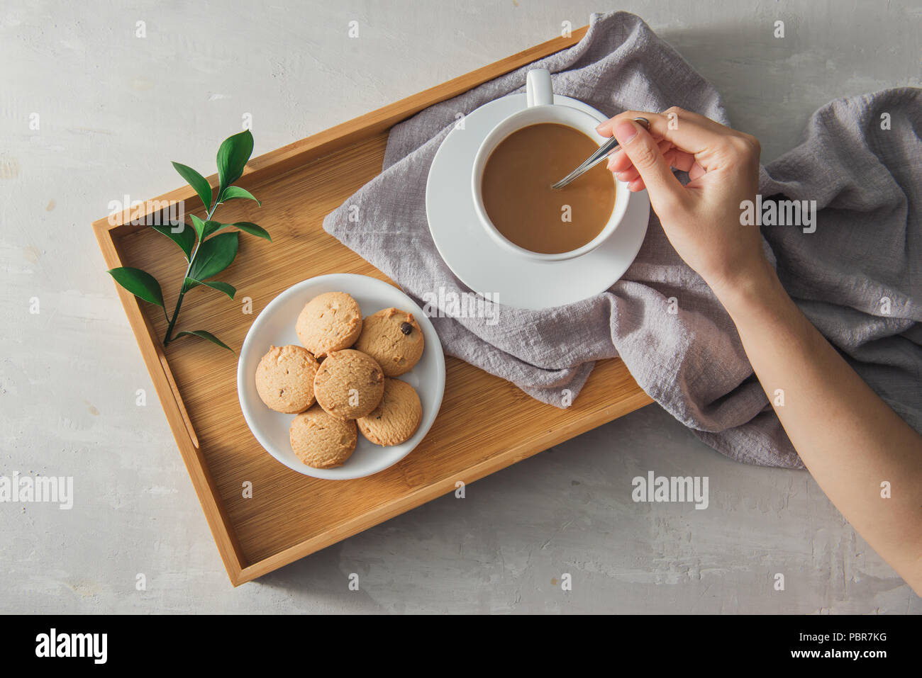 Hand stirring spoon hi-res stock photography and images - Alamy