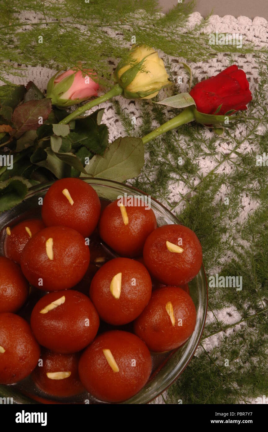 gulaab jamun is a sweet popular in india,pakistan,bangladesh and ...