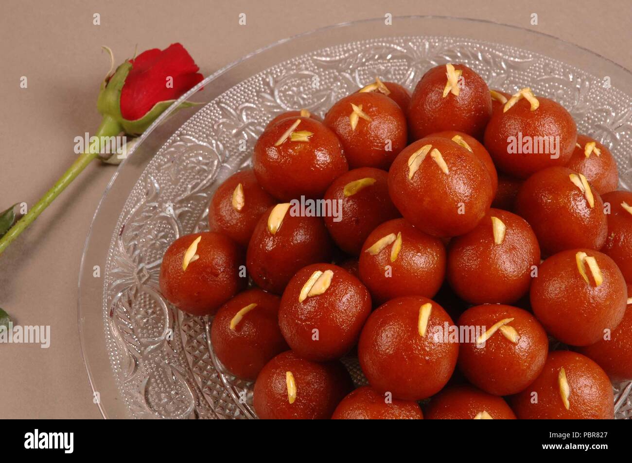 gulaab jamun is a sweet popular in india,pakistan,bangladesh and ...