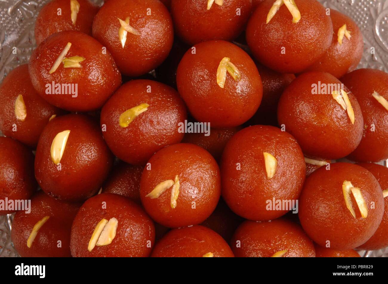 gulaab jamun is a sweet popular in india,pakistan,bangladesh and ...
