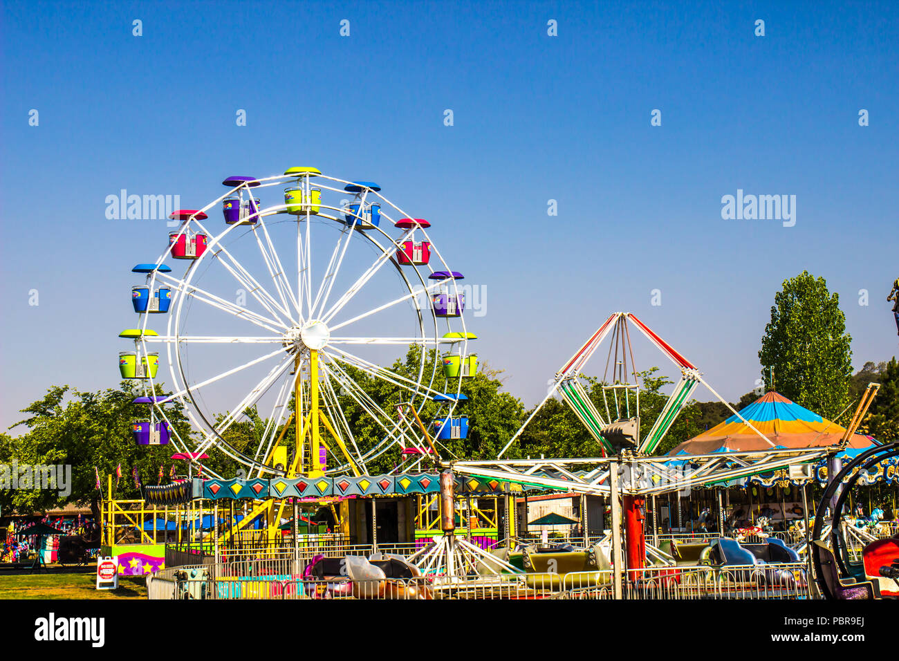 Small ferris wheel fun fair hi-res stock photography and images - Alamy