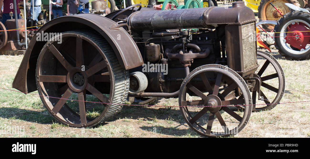 Antique metal Tractor With Unique Wheels Stock Photo - Alamy
