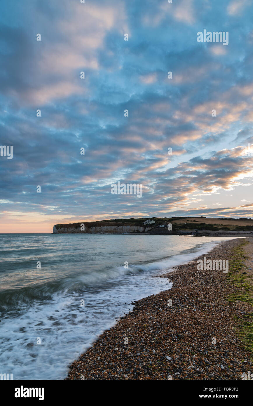 Beautiful dramatic Summer sunset over Seven Sisters landscape in Englad ...