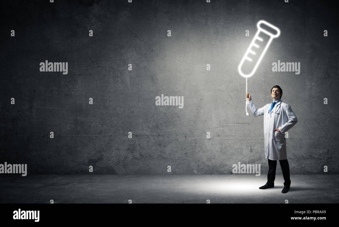 Doctor and vial symbol Stock Photo - Alamy