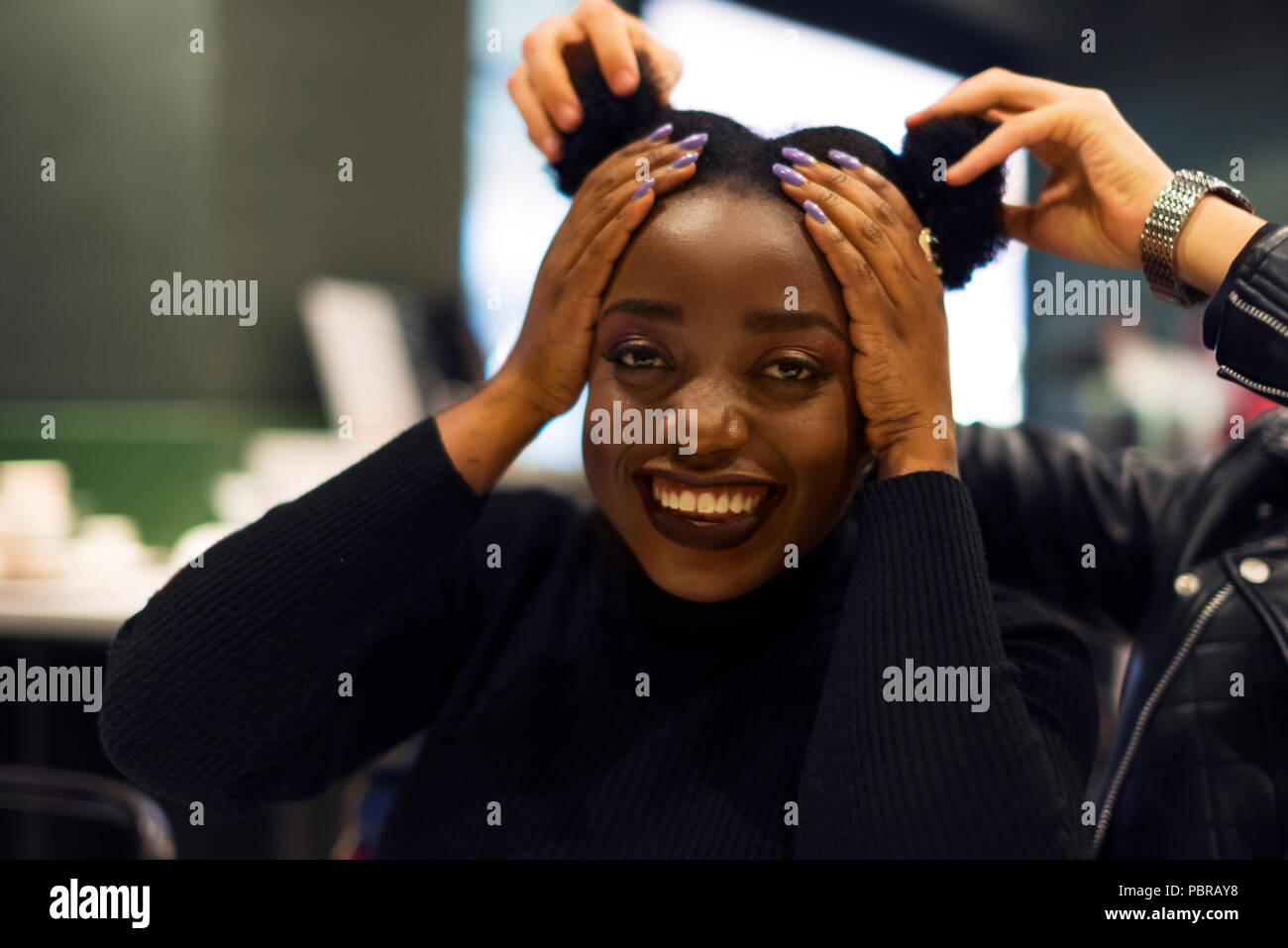 African Girls portrait in a cafe with a happy facial expressions and ...