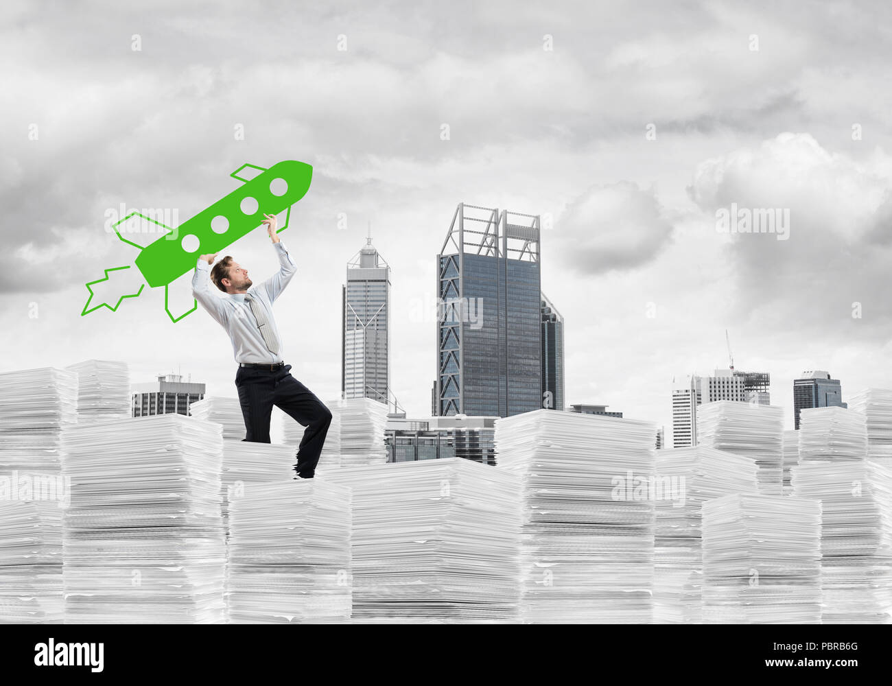 Businessman with drawn rocket Stock Photo - Alamy