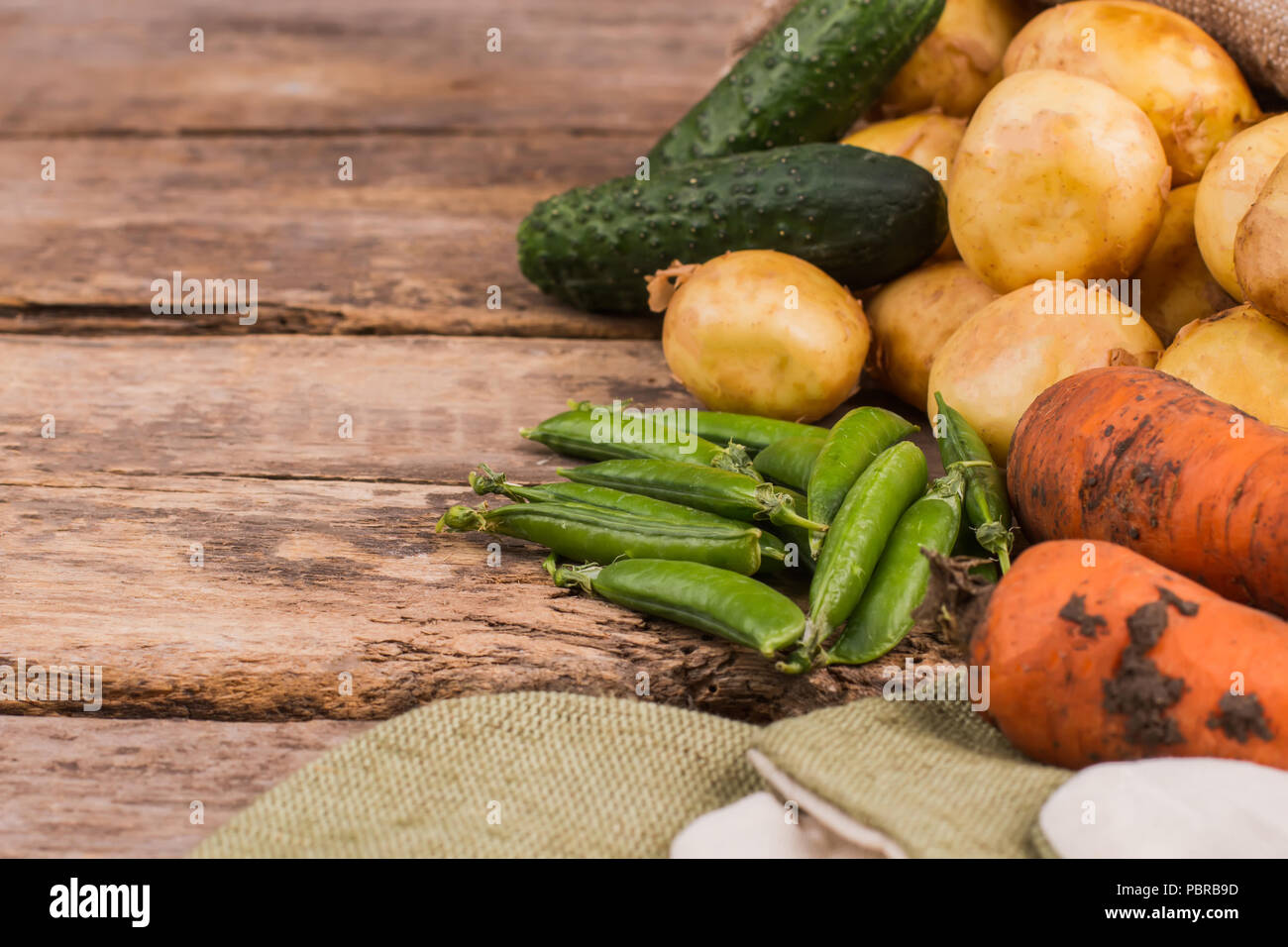 Raw fresh vegetables close up. Wooden desk background Stock Photo - Alamy