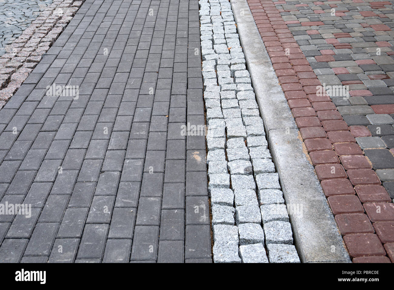 Different kind of pavement cobblestone Stock Photo - Alamy