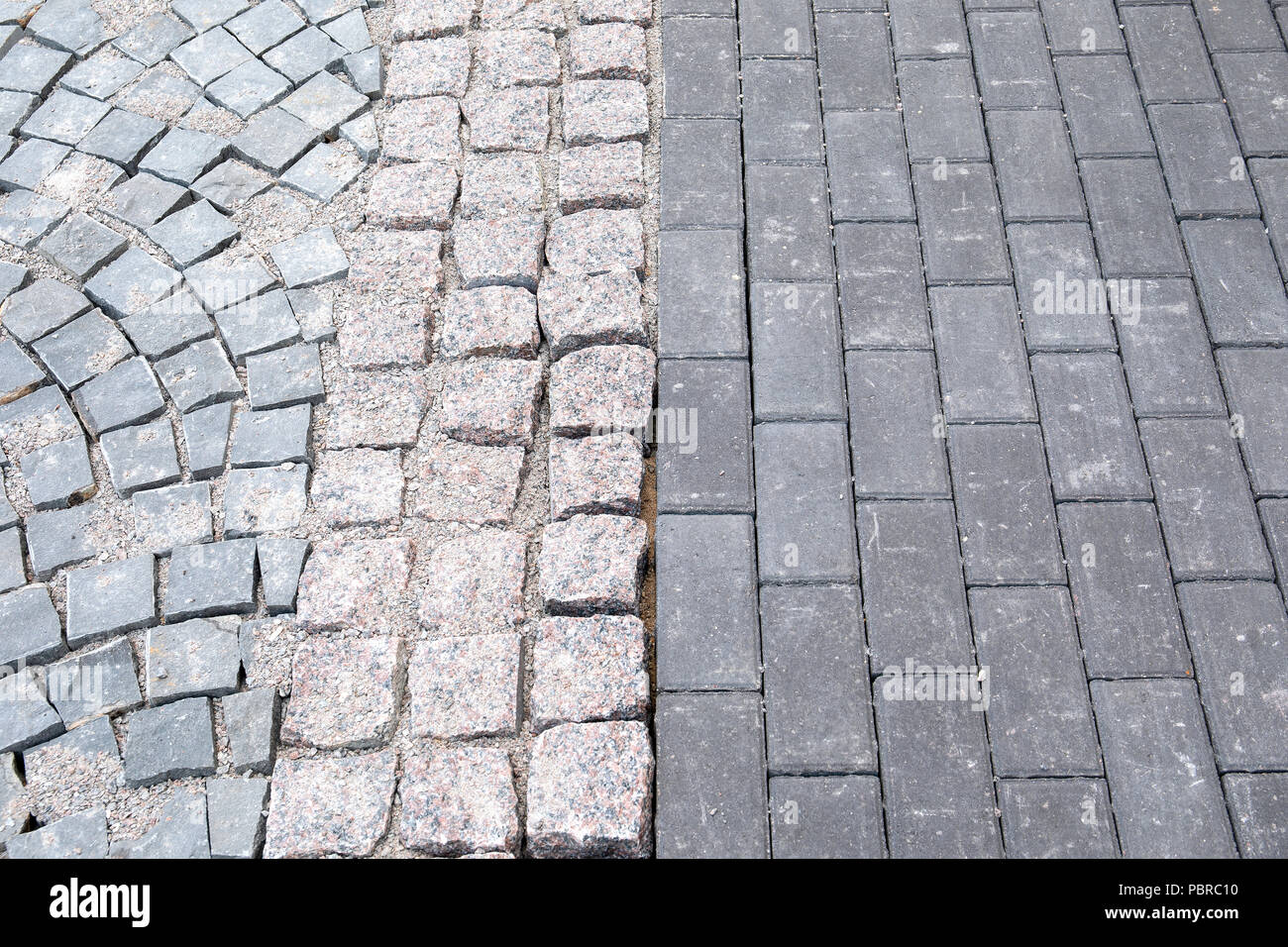 Different kind of pavement cobblestone Stock Photo - Alamy