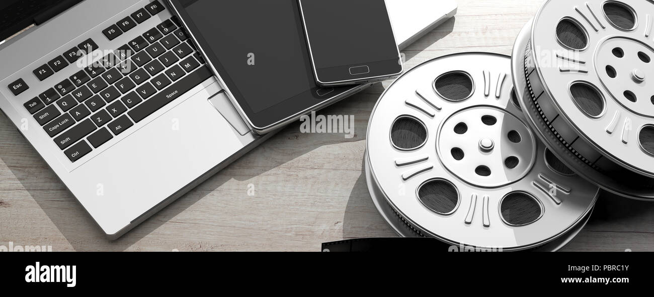 Cinematography and electronic devices. Film movie reels, laptop, tablet ...