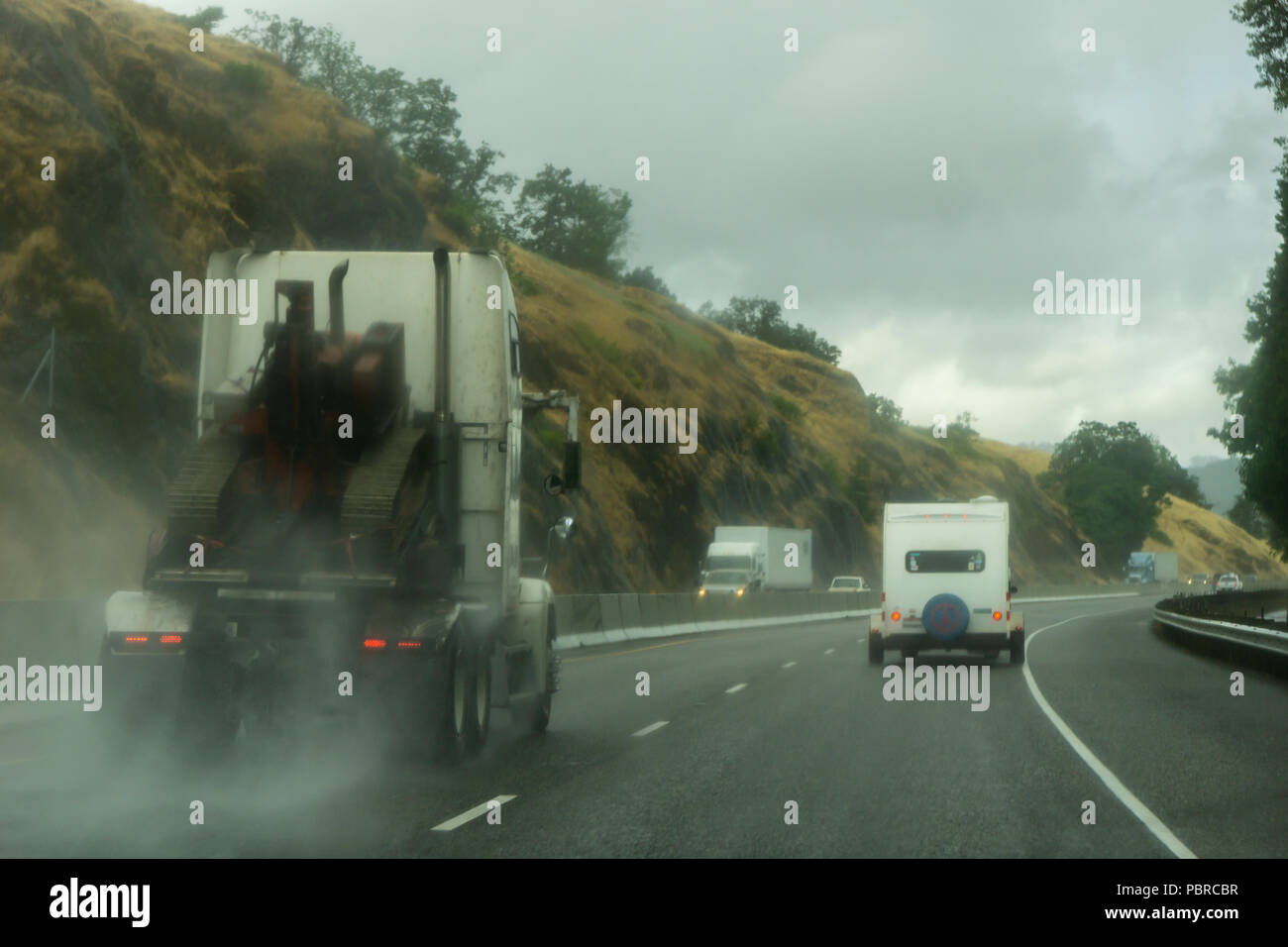 Caution water on road during rain hi-res stock photography and images ...