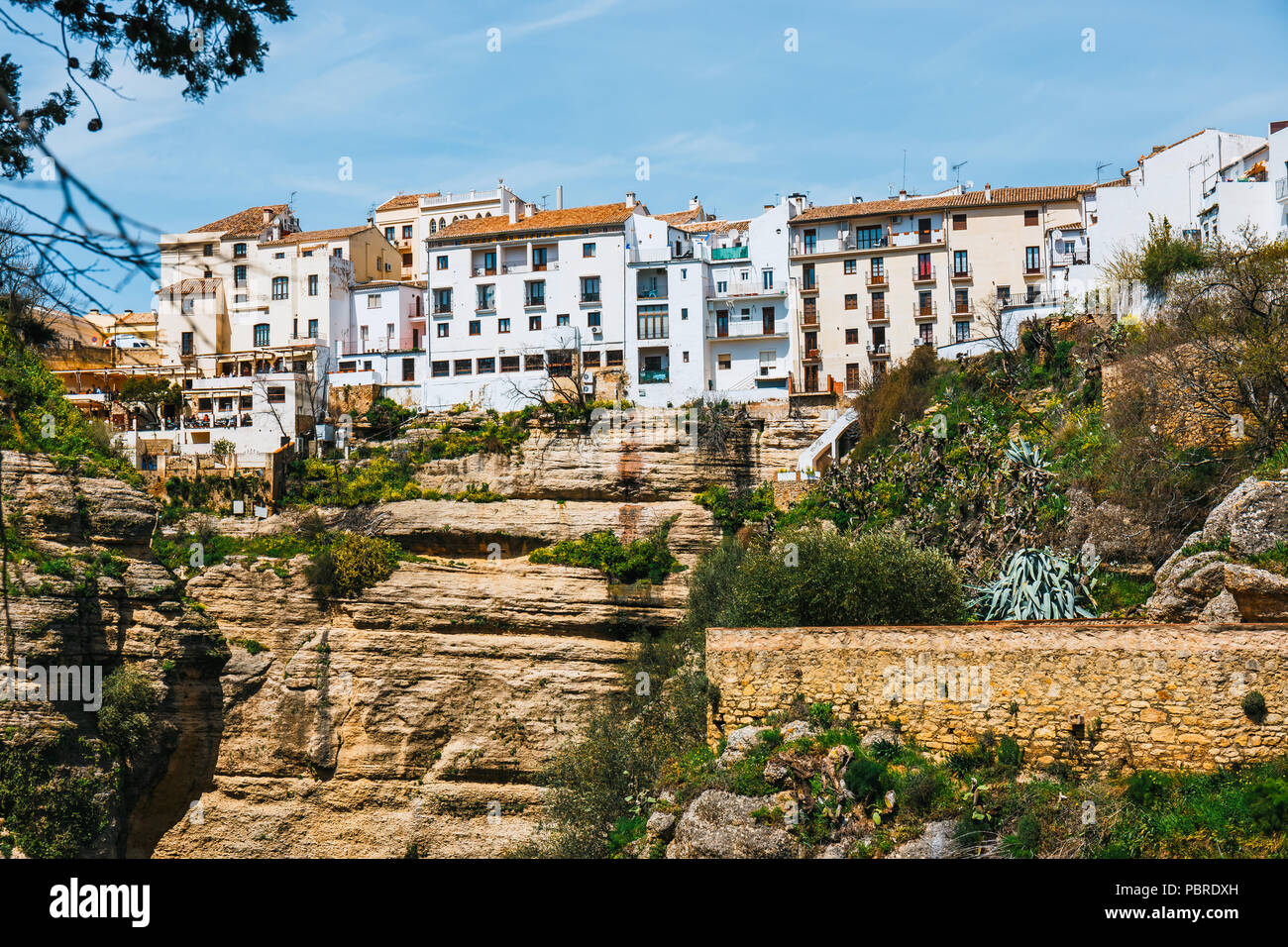El Tajo Gorge Canyon with white spanish houses in Ronda, Spain Stock ...