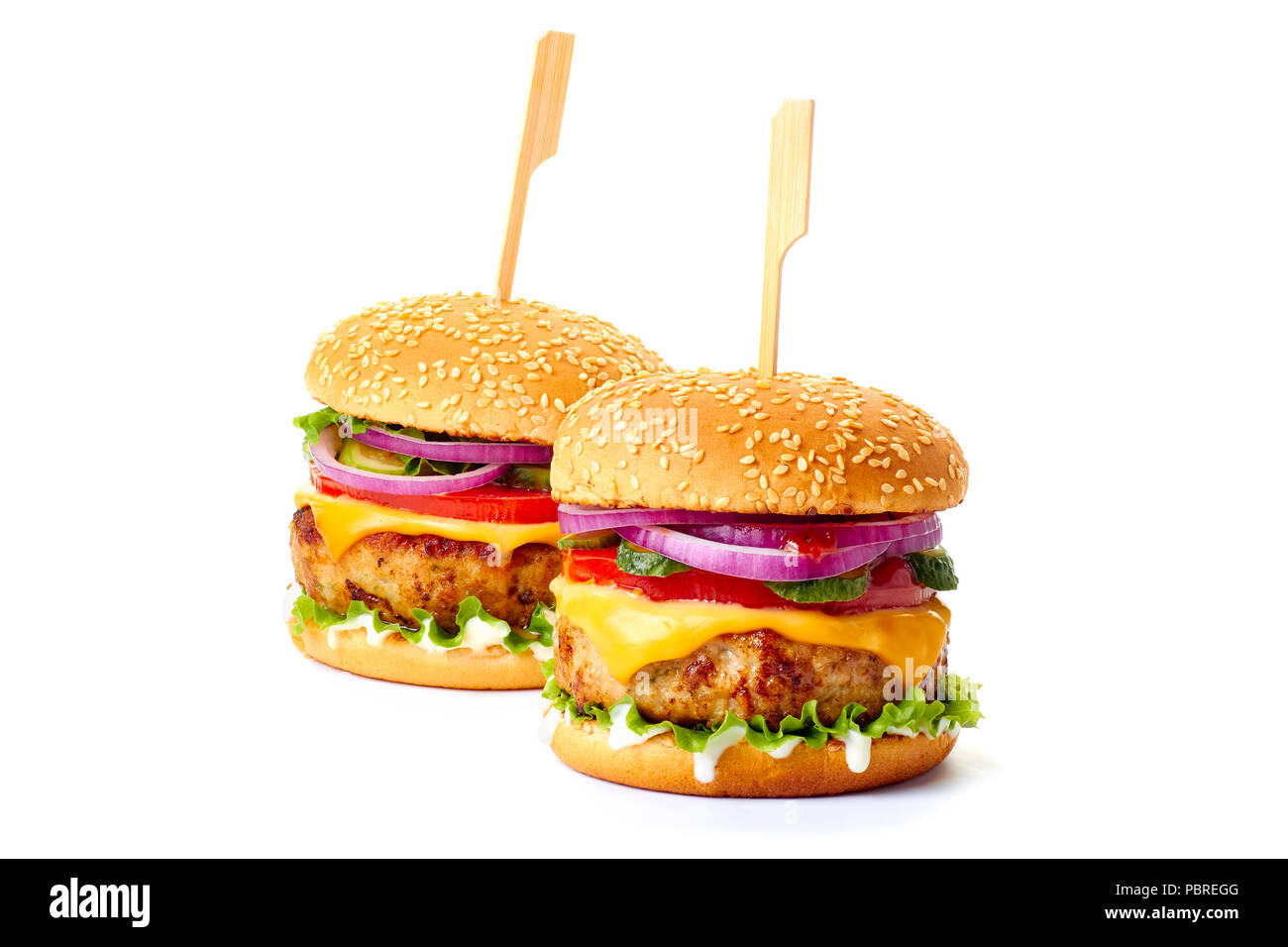 Two burgers on white Stock Photo - Alamy