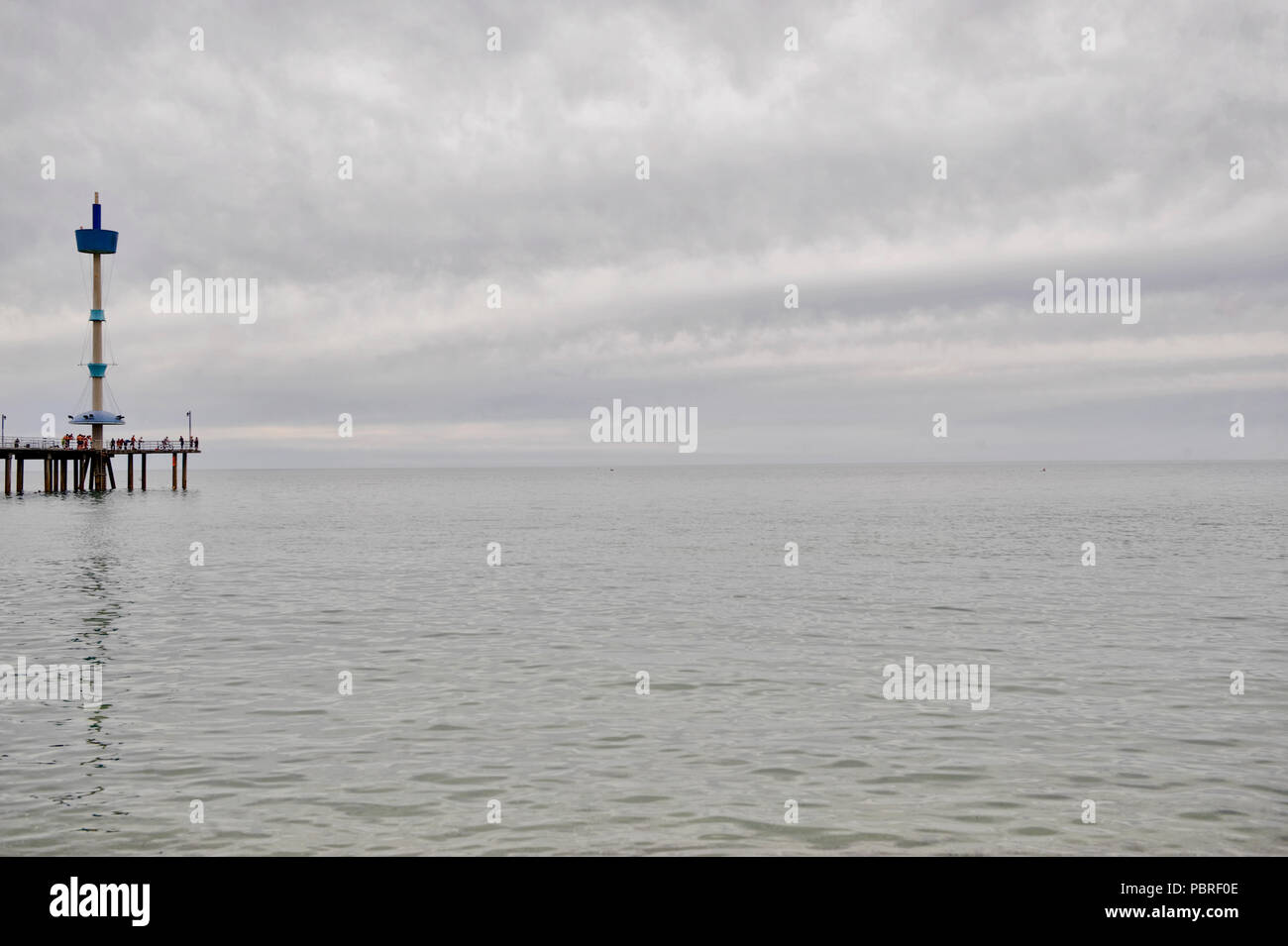 People at end of pier Stock Photo - Alamy