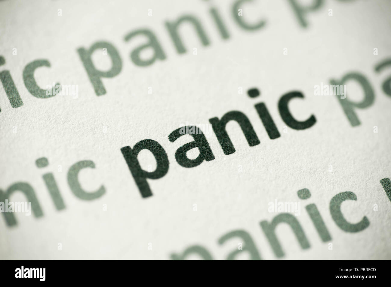 word panic printed on white paper macro Stock Photo - Alamy