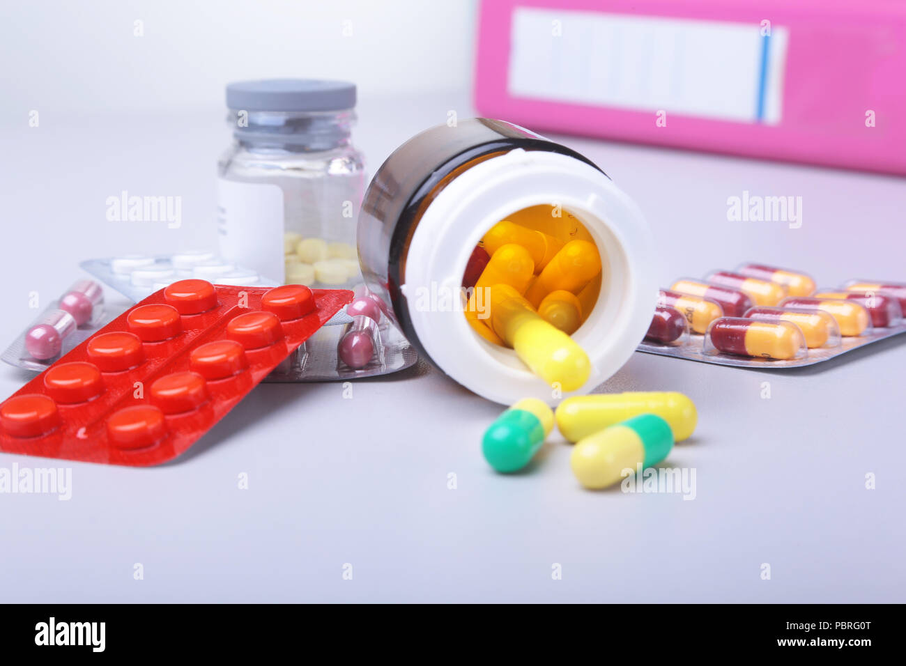 Red capsules arrangement hi-res stock photography and images - Alamy