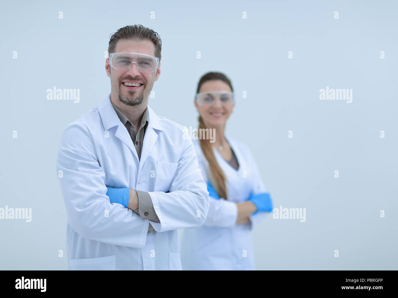 portrait of two successful researchers standing together Stock Photo ...