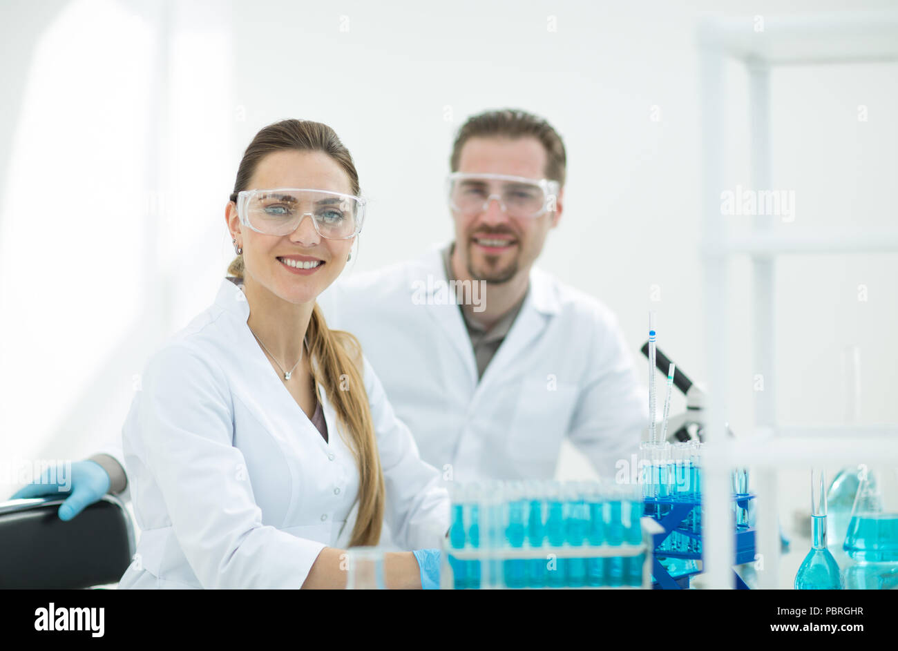 two scientists biologists sitting in a laboratory Stock Photo - Alamy
