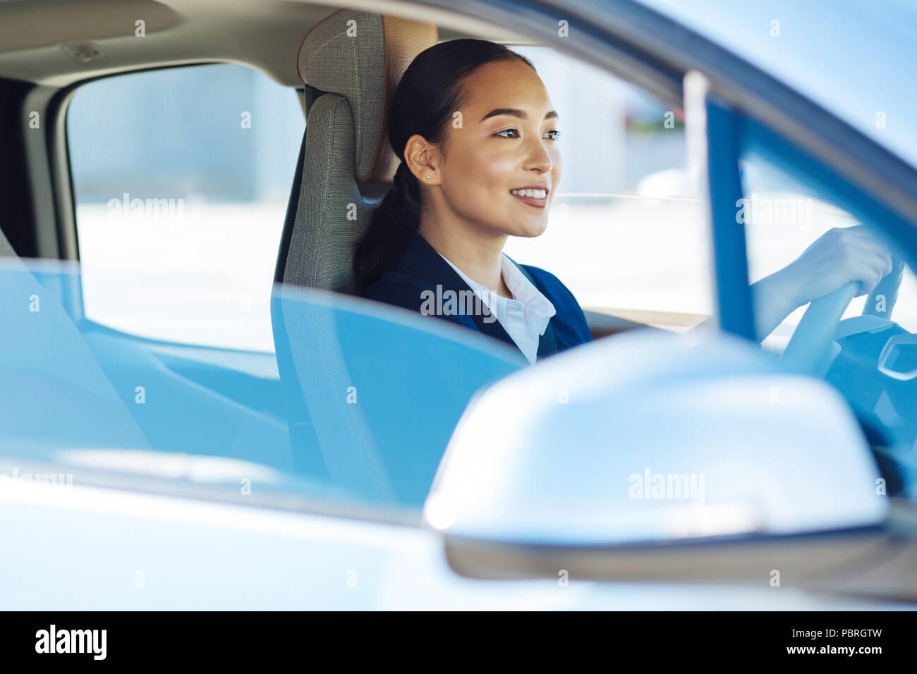 Woman car alone happy drive road hi-res stock photography and images ...