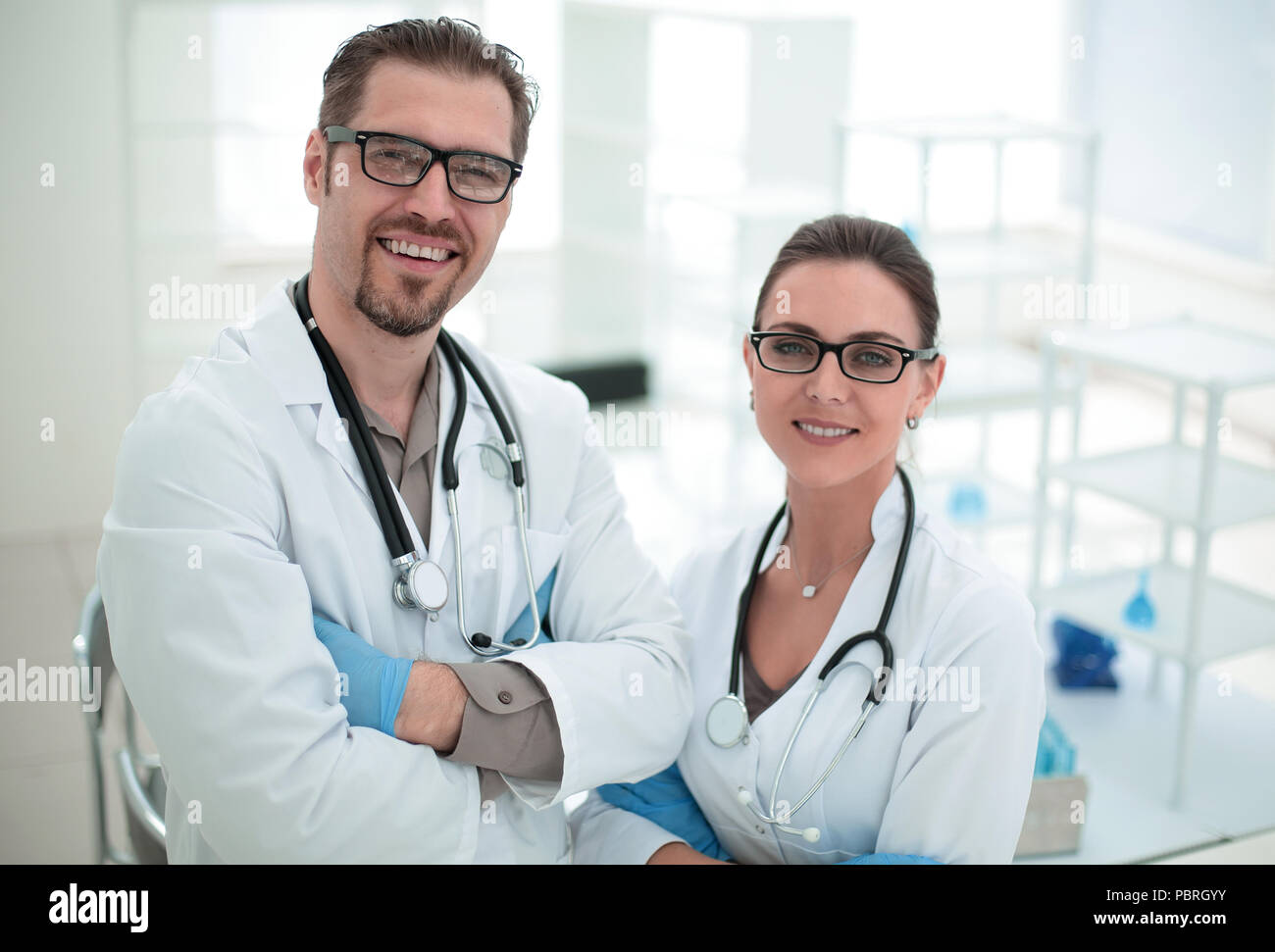 two researchers on the background of the laboratory Stock Photo - Alamy