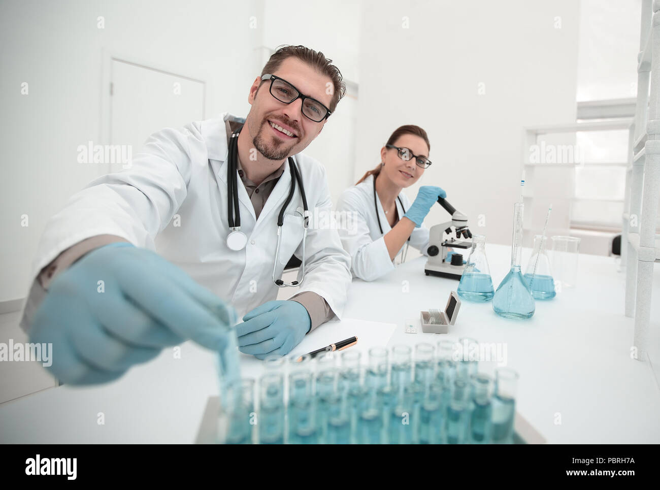 background image.scientists working in the laboratory Stock Photo - Alamy